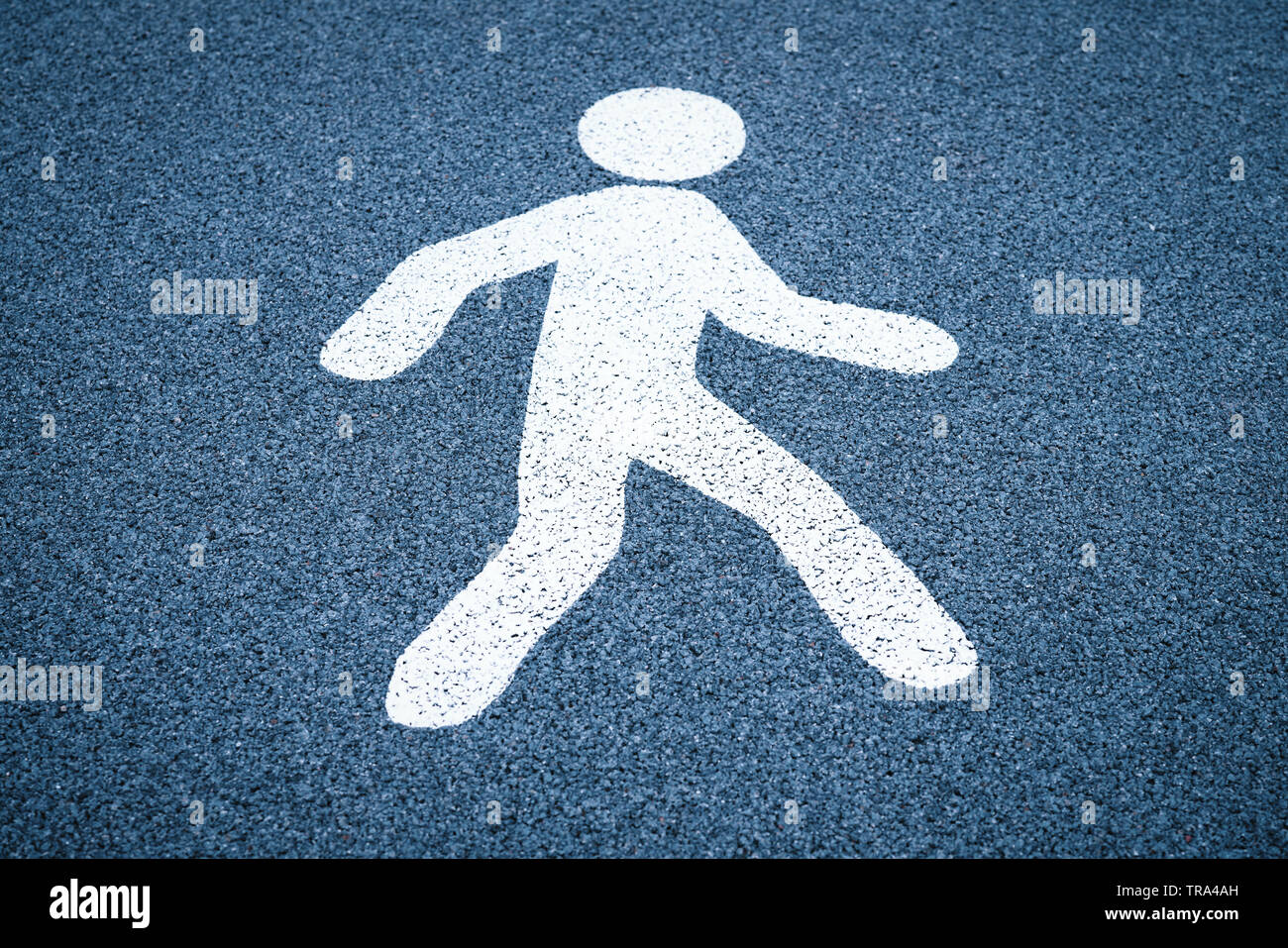 Walk sign, pedestrian street sign on a wet dark asphalt floor Stock ...