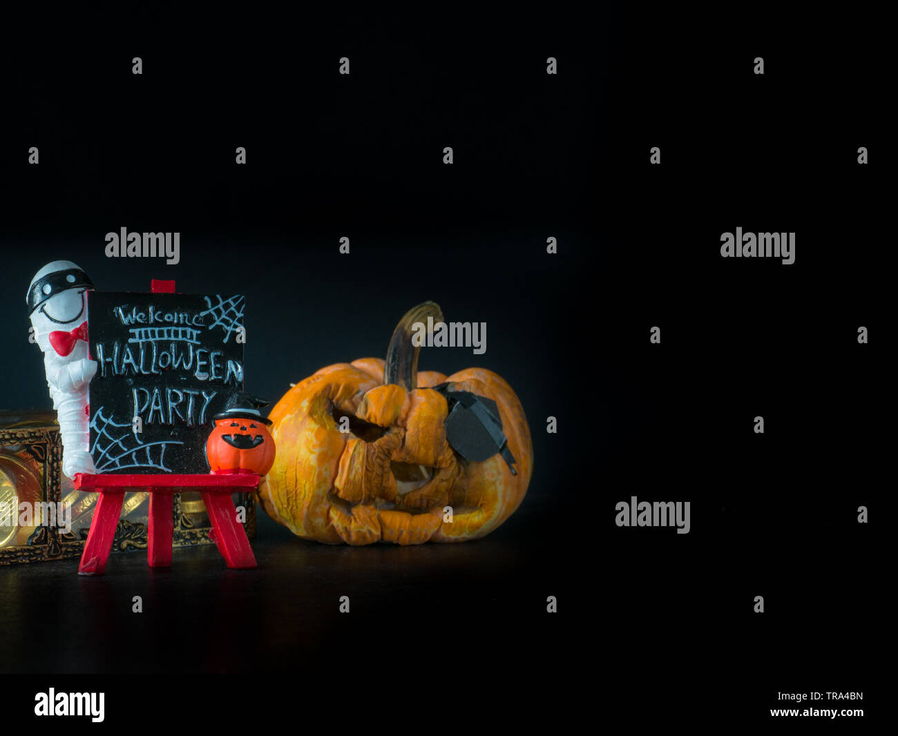 Welcome halloween party notice board on black background, blurred image ...