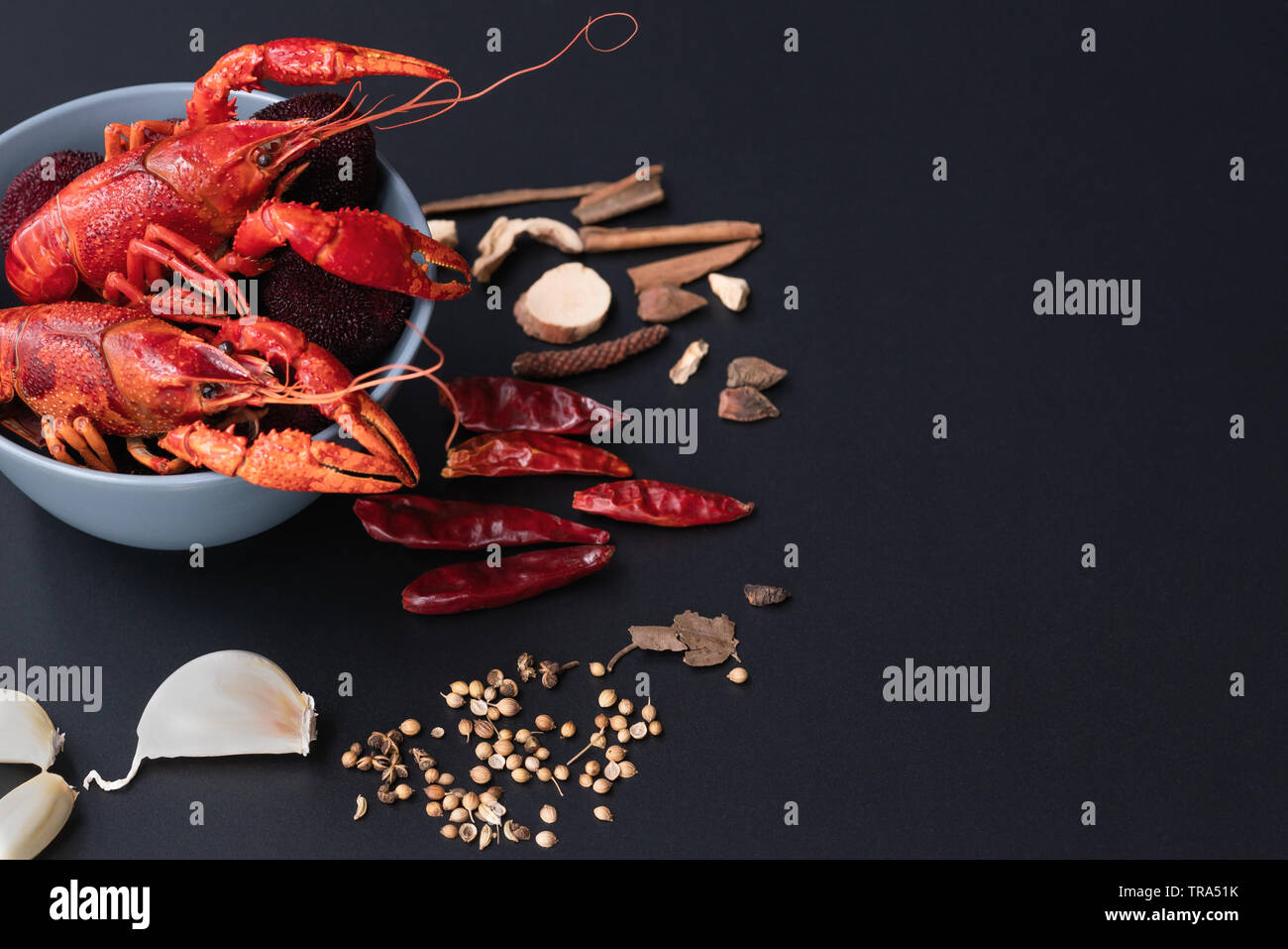 Crayfish red, Baby Lobster with herb for stir fry on black background ...