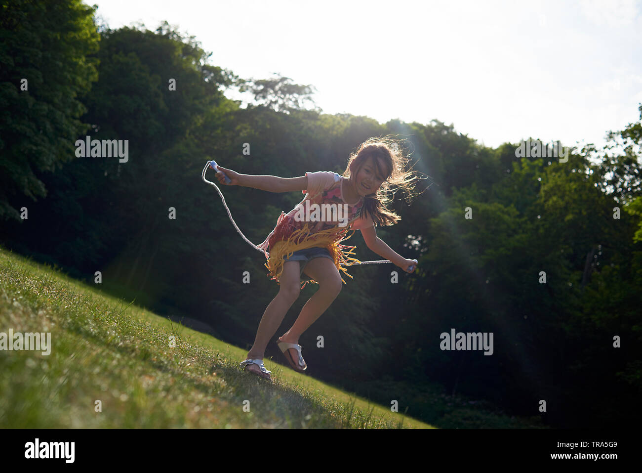 Asian children jump rope hi-res stock photography and images - Alamy