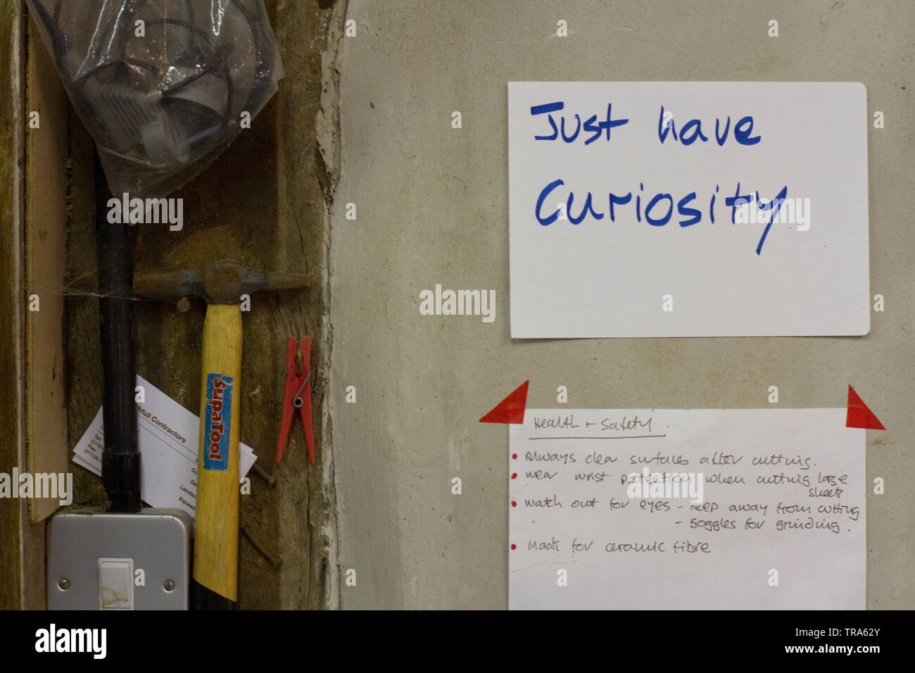 Instruction on an artist's wall Stock Photo - Alamy