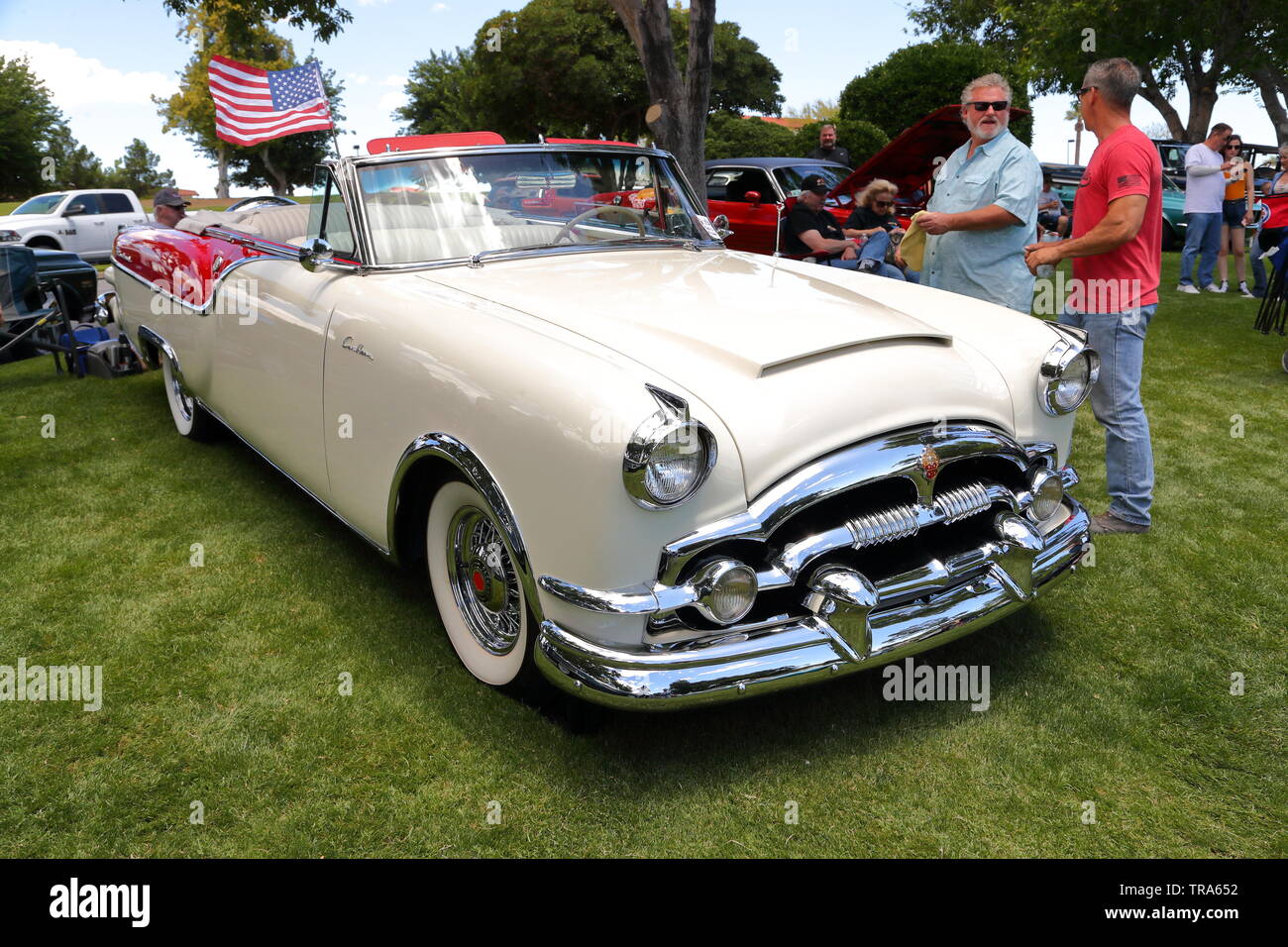 A Packard Caribbean Convertible amongst vintage vehicles and Hot Rods ...