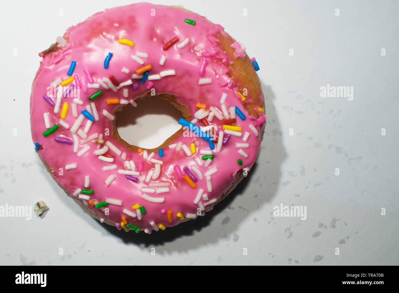 Sugar sprinkled pink donut hi-res stock photography and images - Alamy