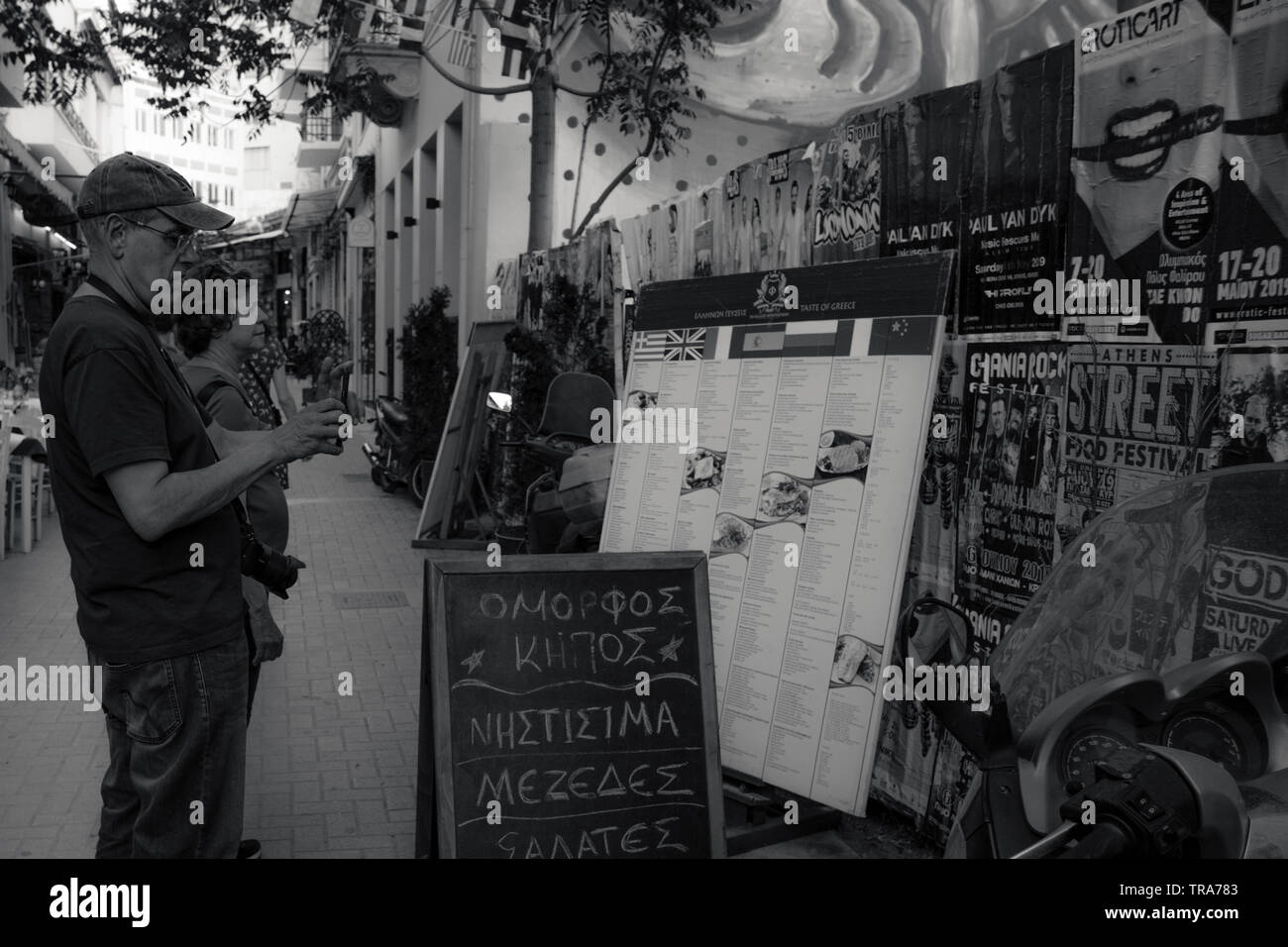 Checking the menu hi-res stock photography and images - Alamy