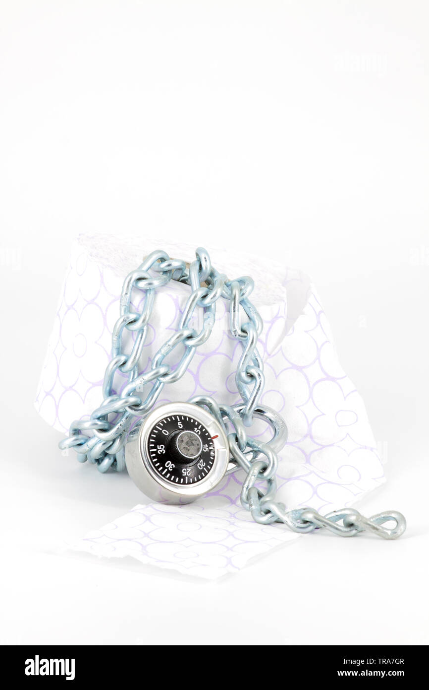 Roll toilet paper locked with padlock and chain on white background ...
