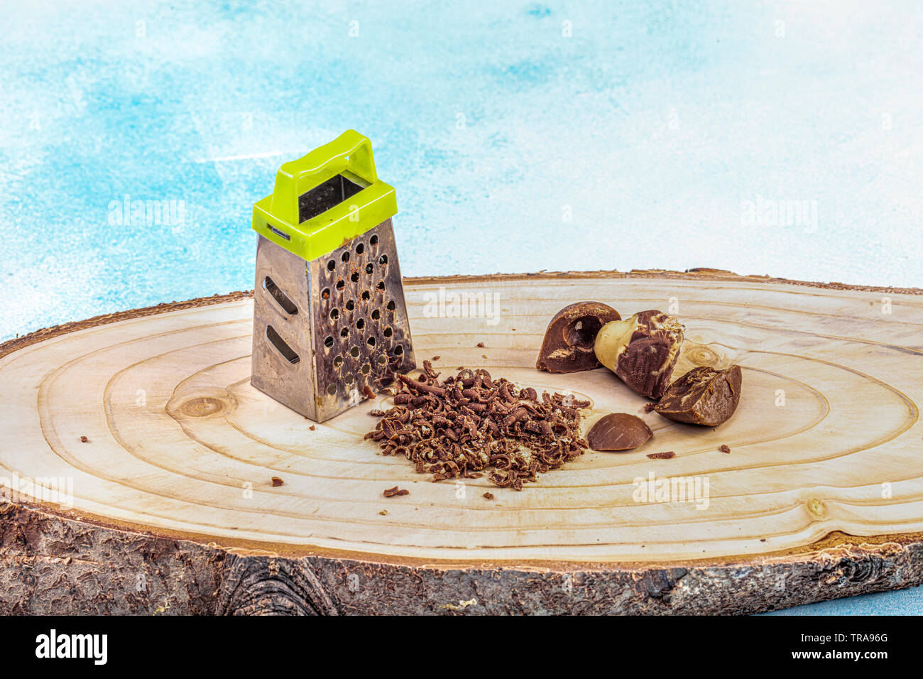shredded chocolate pieces falling on a chocolate pile with nuts Stock ...