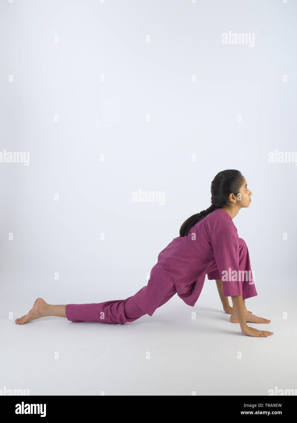 A YOUNG GIRL DOING SURYA NAMASKAR Stock Photo - Alamy