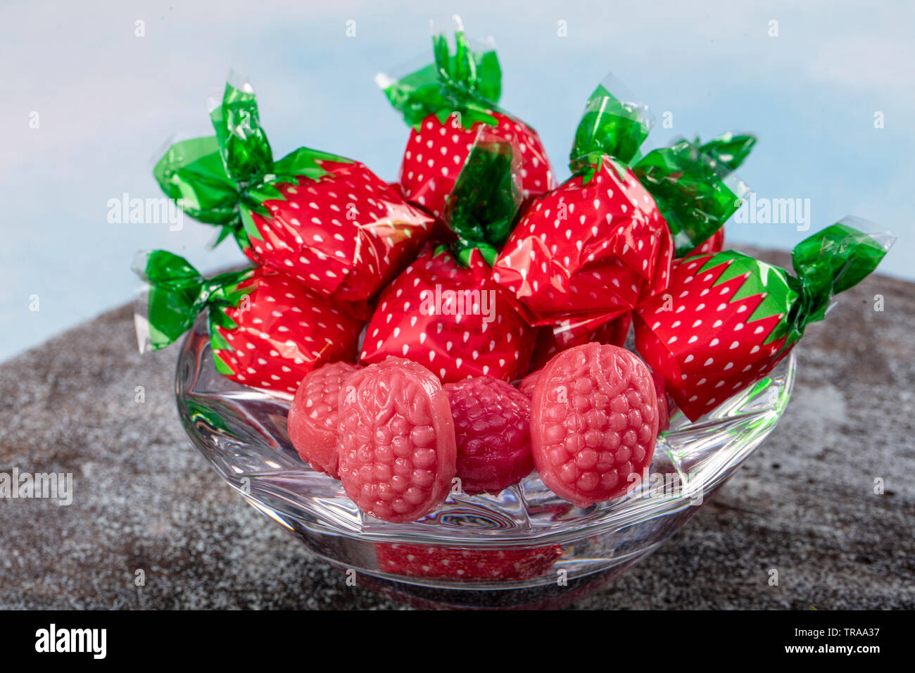 Strawberry sweets and strawberry flavoured candy concept with close up ...
