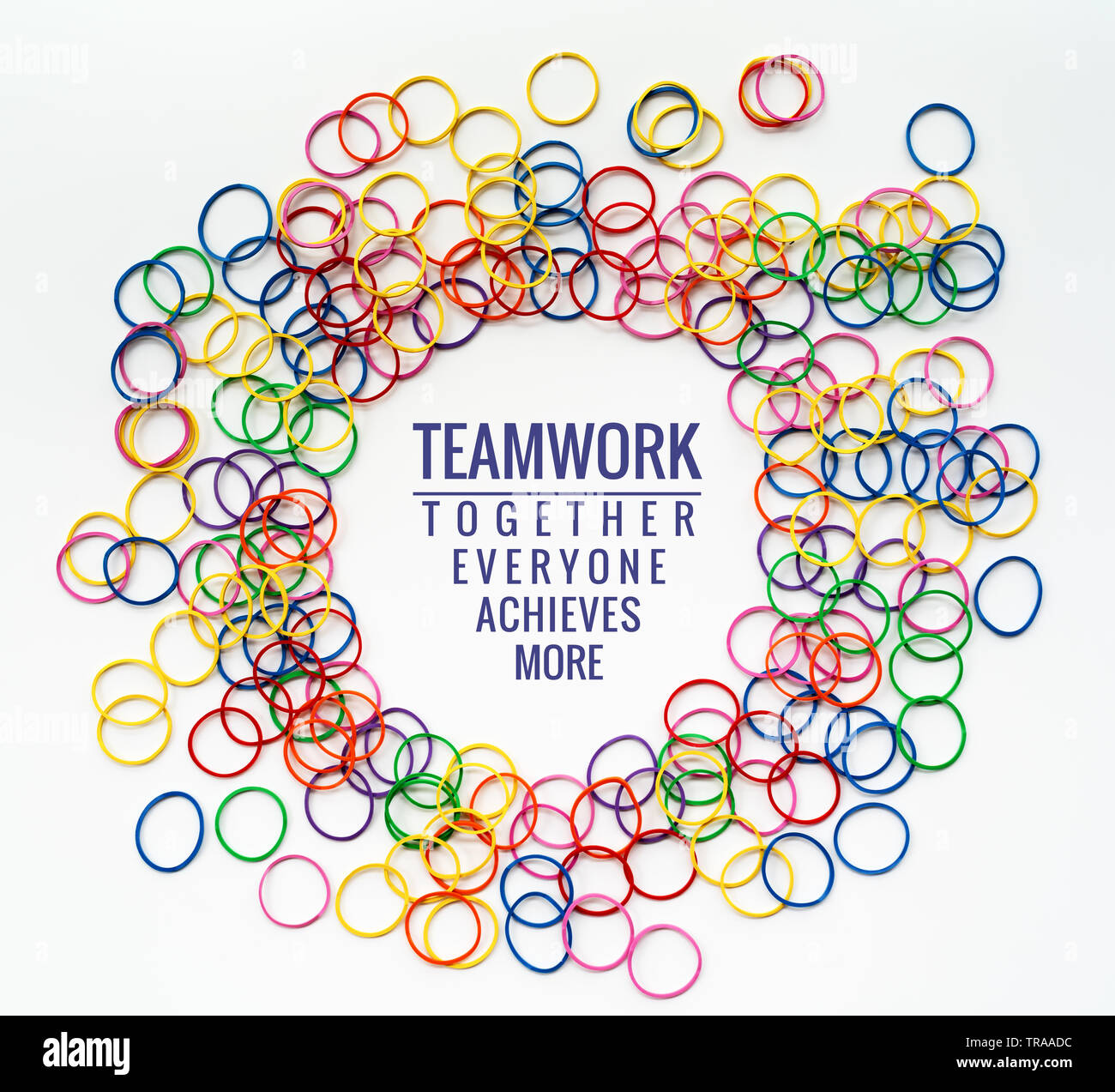Teamwork concept. group of colorful rubber band on white background ...
