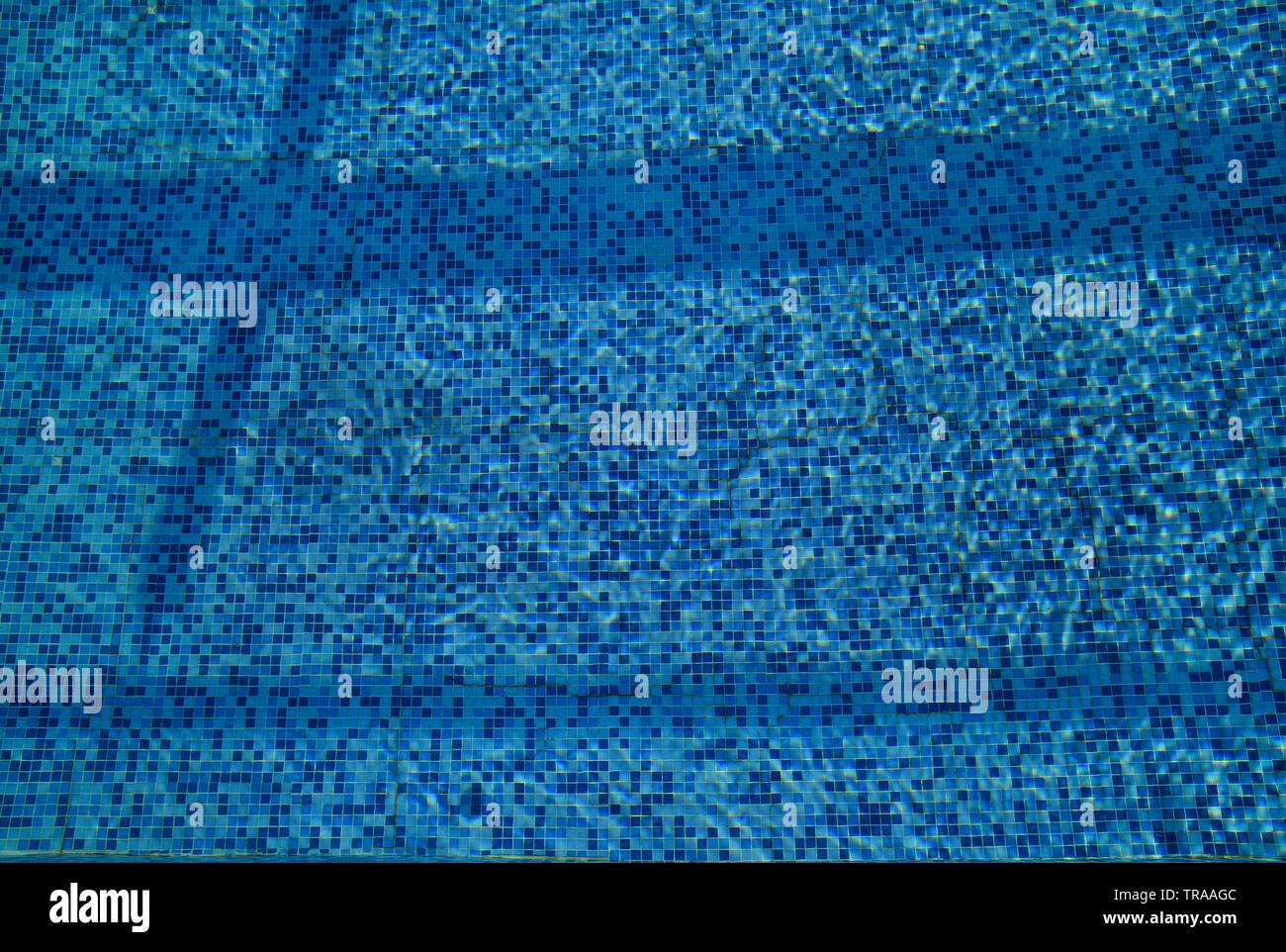 Swimming pool bottom caustics ripple and flow with waves background ...