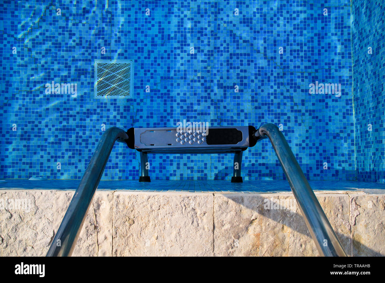 Handrail on pool. Swimming pool with stair at tropical resort. Pool ...