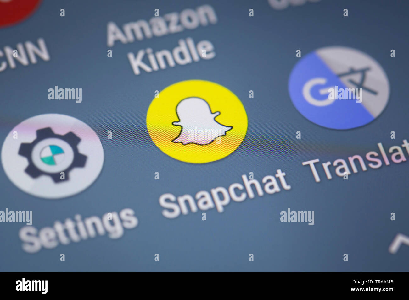 Snapchat logo icon on mobile phone screen Stock Photo - Alamy