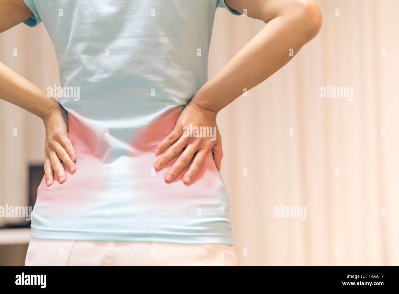 back pain at home. women suffer from backache. healthcare and medical ...