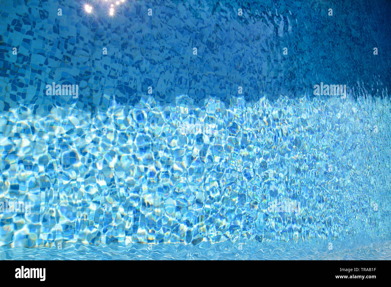 Swimming pool bottom caustics ripple and flow with waves background ...