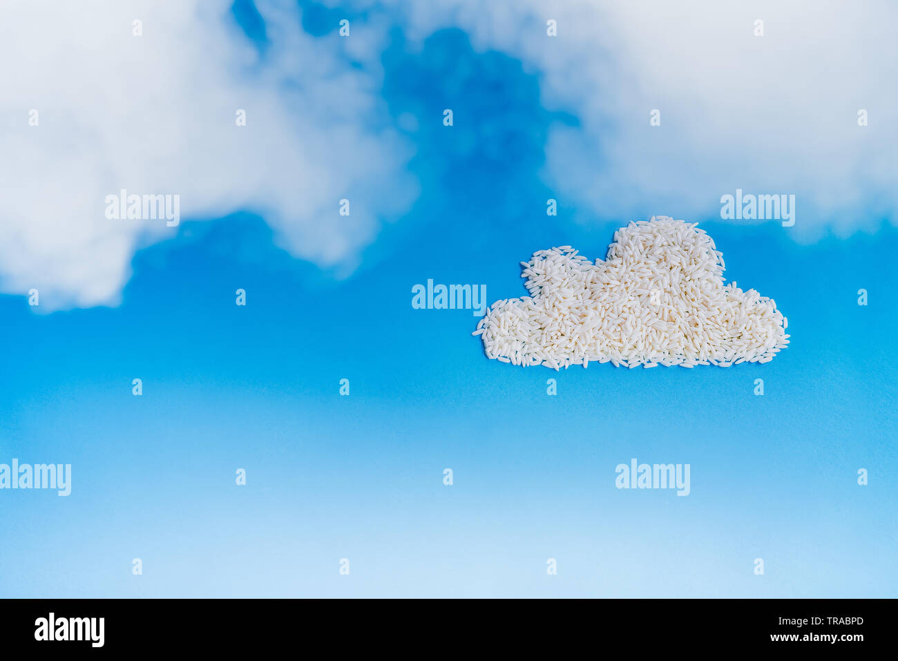 White rice as fluffy cloud shape in the deep blue sky background, cloud ...
