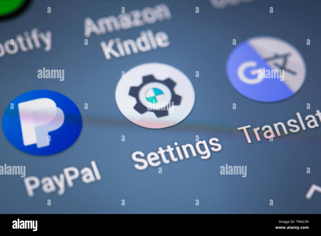 Settings logo icon on mobile phone screen Stock Photo - Alamy