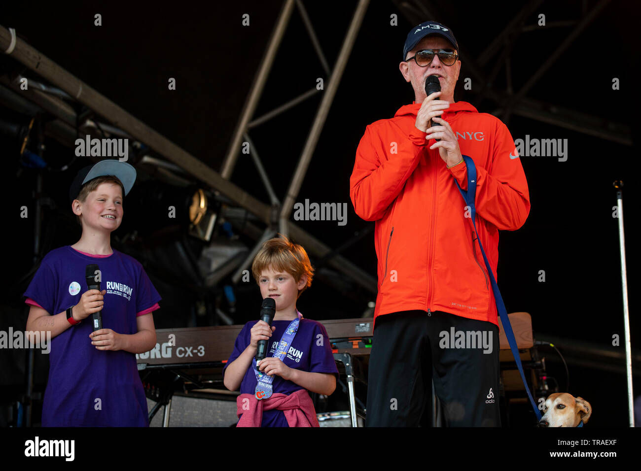 Chris Evans On Stage With Sons Noah Left And Eli At The Run Fest Run Running And Music