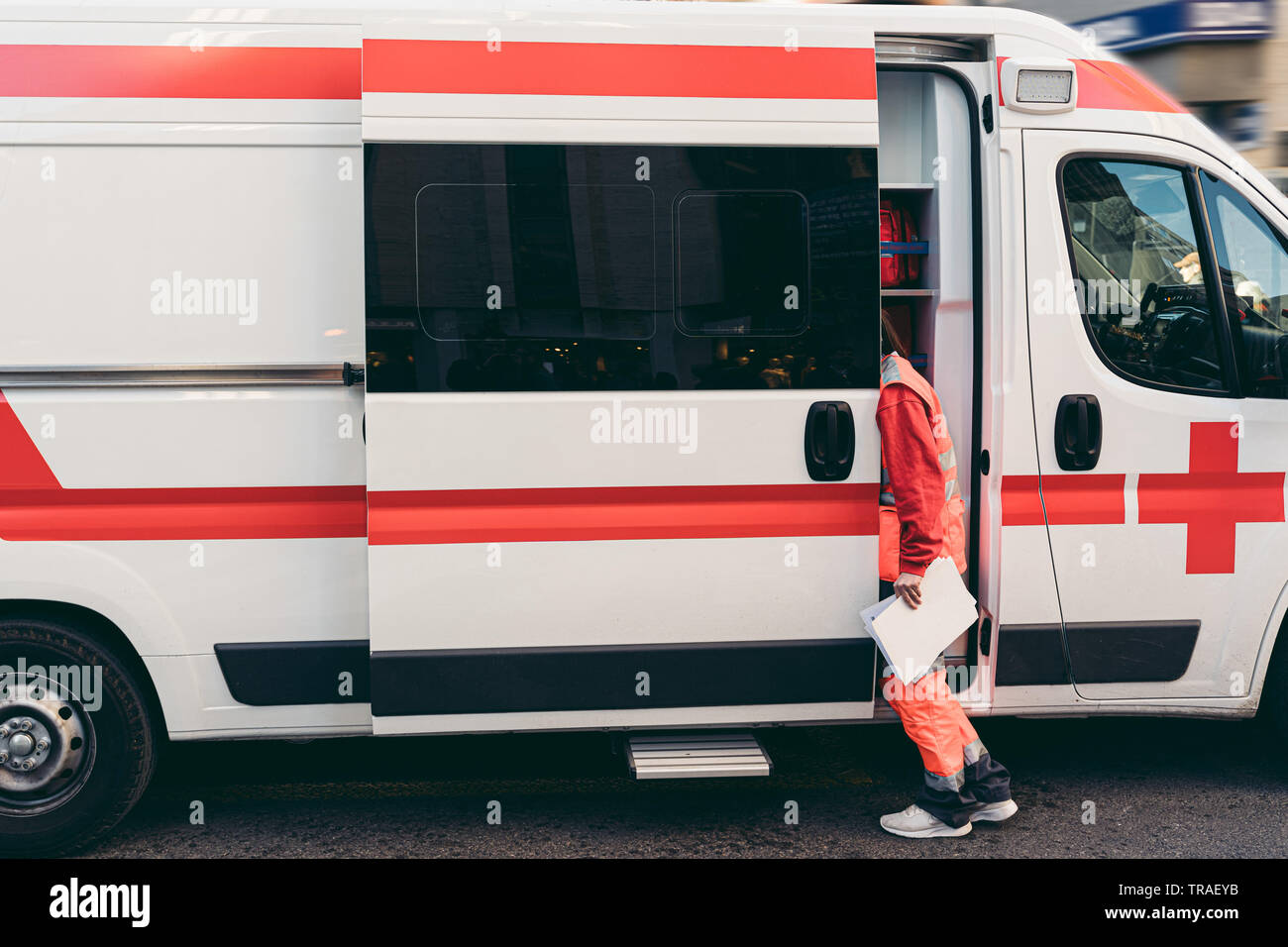 Valencia,Spain - March 18, 2019: Red cross paramedic getting into ...