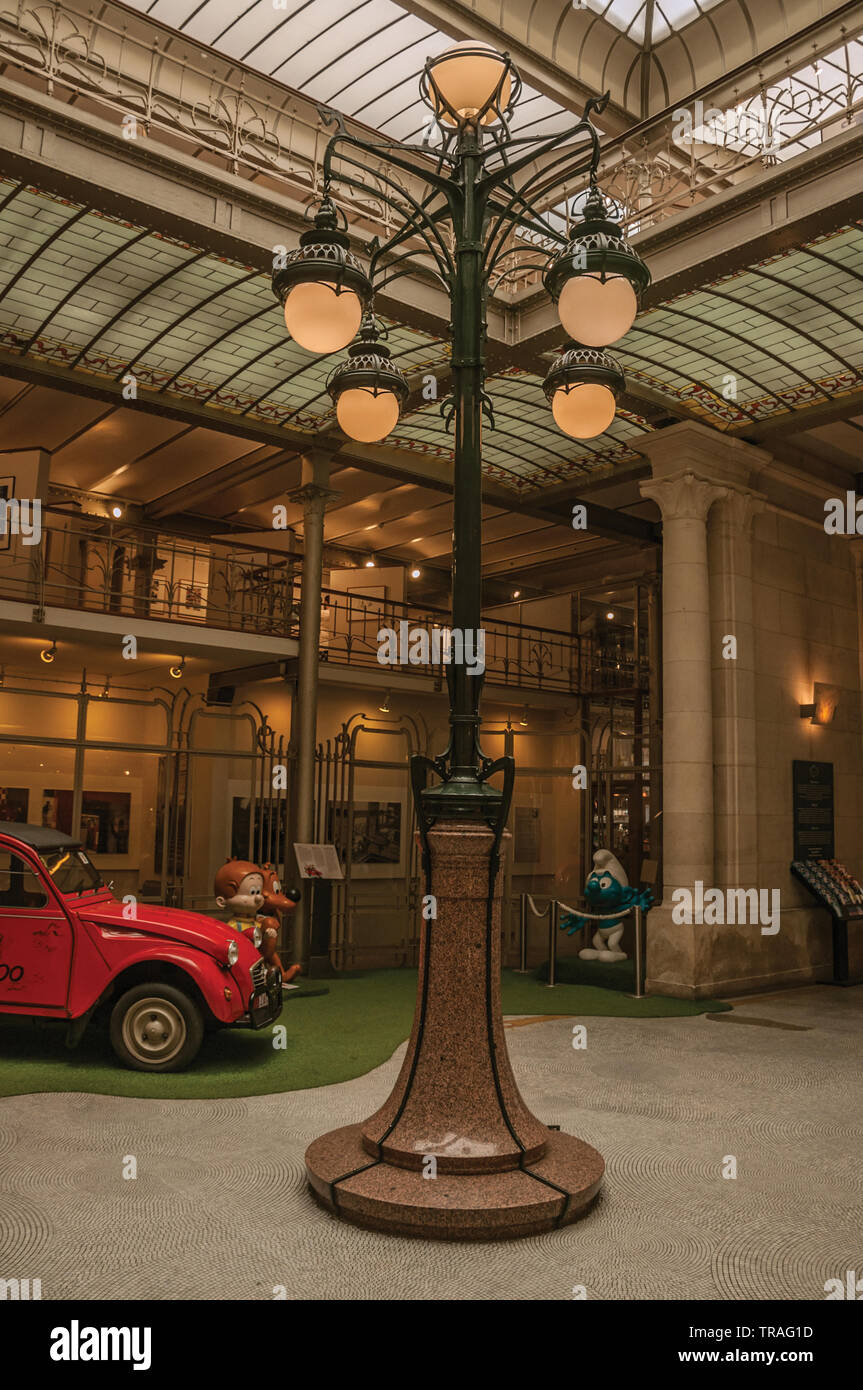 Main hall of the Comics Art Museum in Brussels. Vibrant and friendly ...