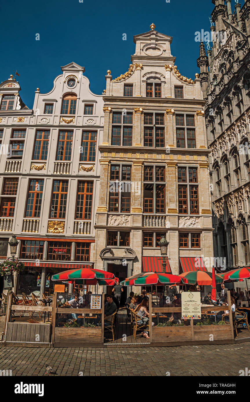 Facade of old typical buildings in the Grand Place of Brussels. Vibrant ...