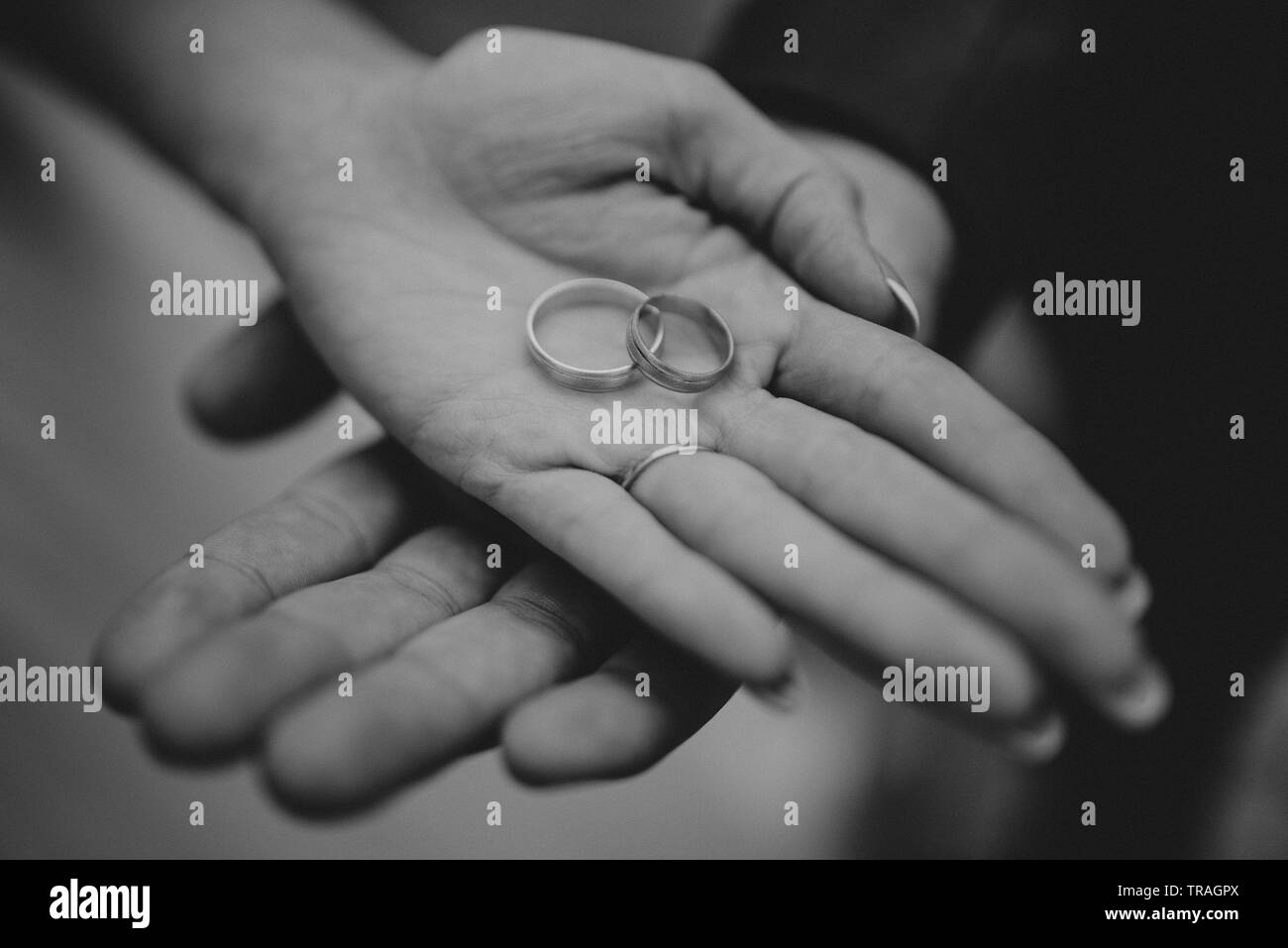 Wedding rings for bride and groom Stock Photo - Alamy