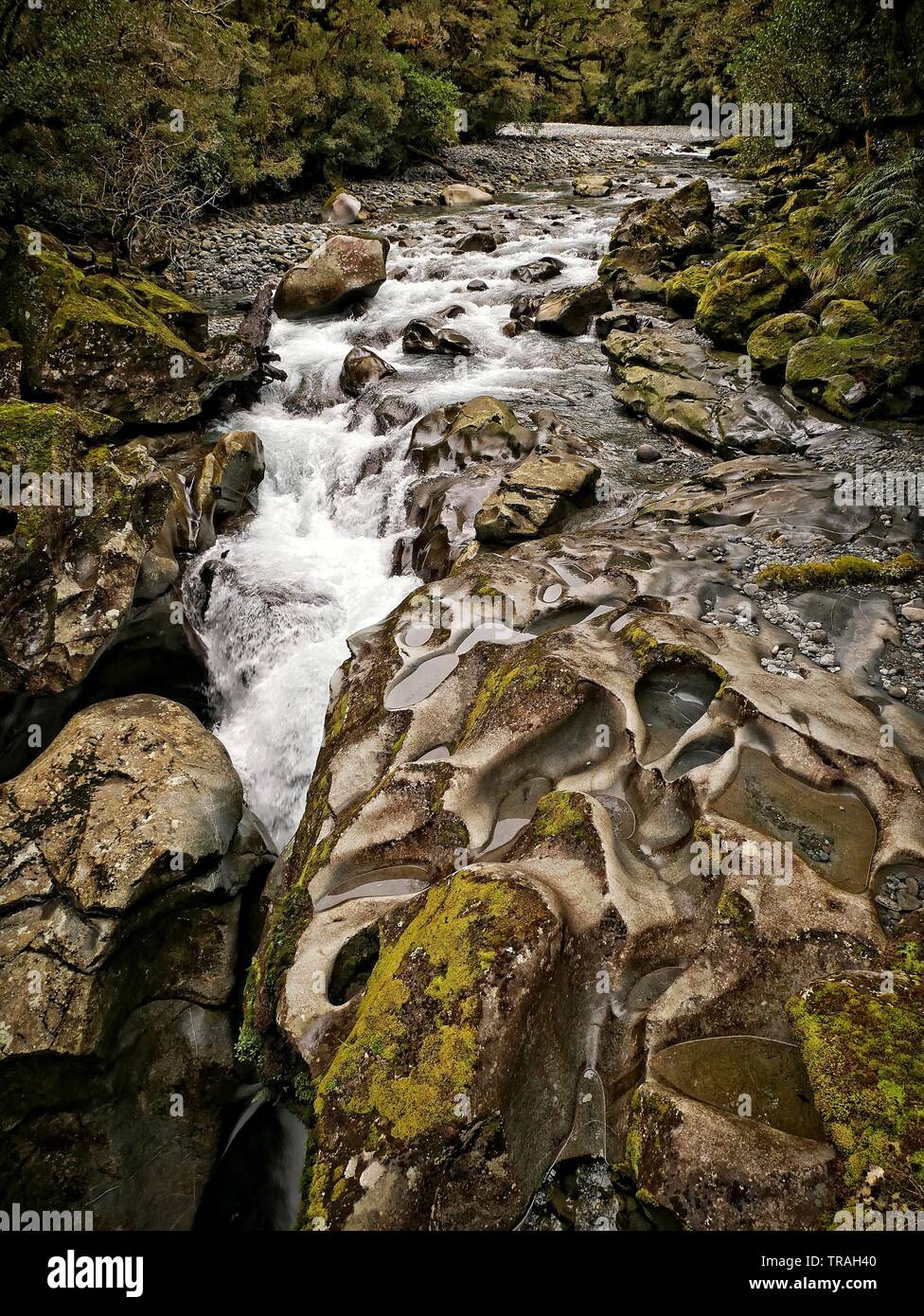 Rock pool with waterfall Stock Photo - Alamy