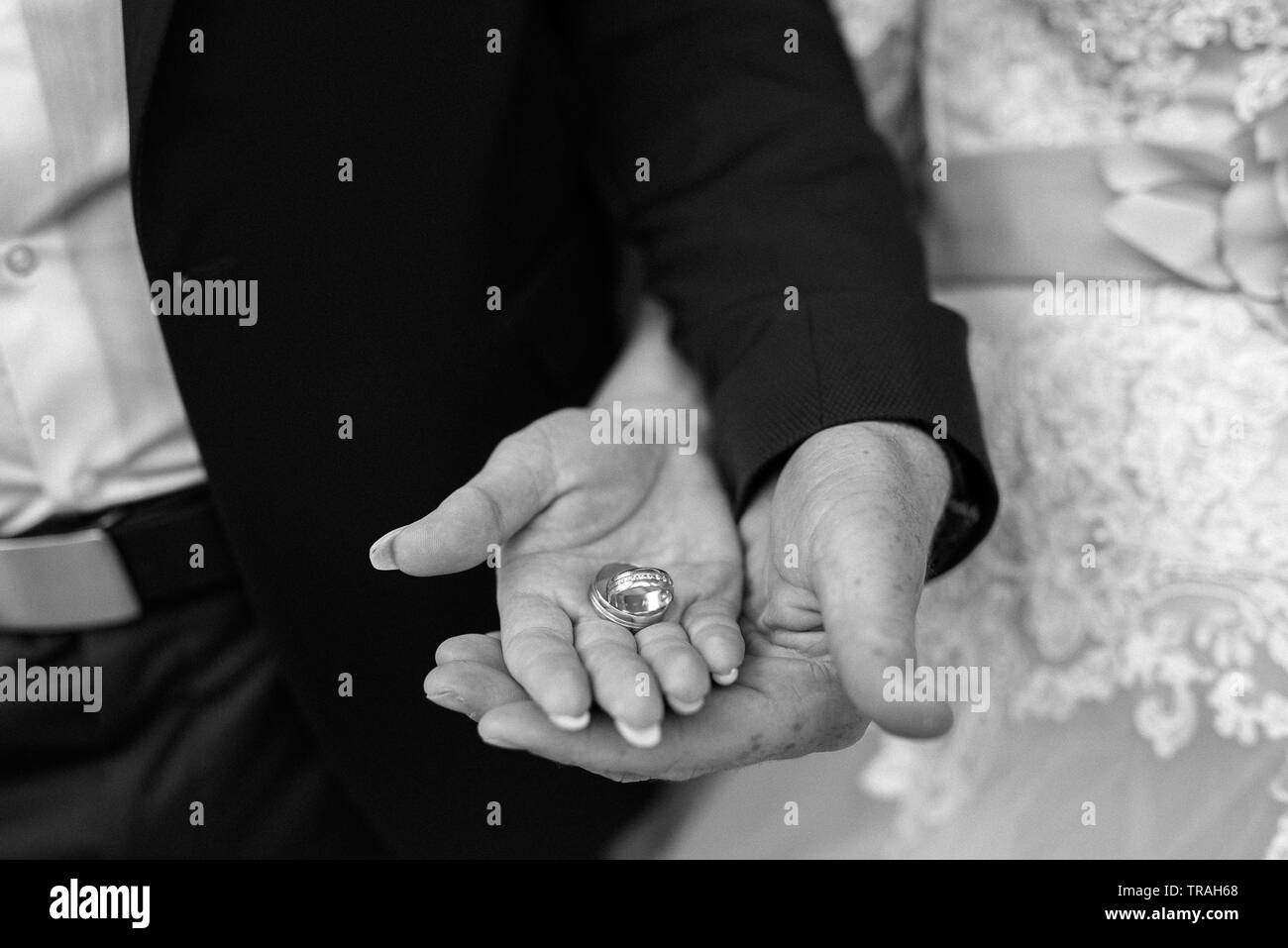 Wedding rings for bride and groom Stock Photo - Alamy