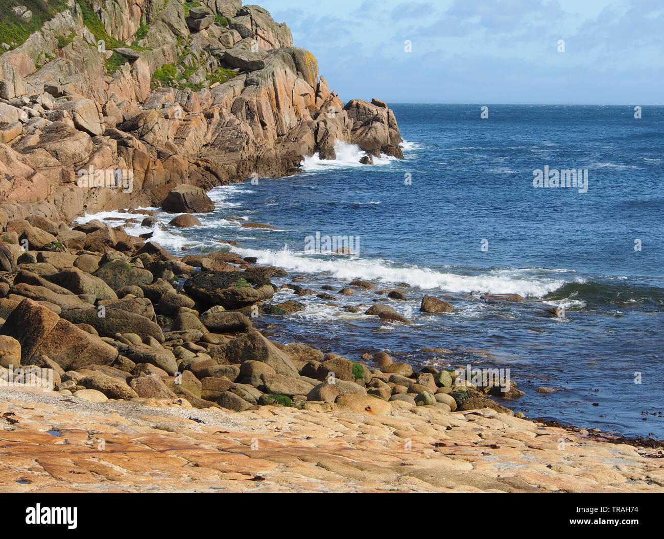 Sea splashing up against the rocky shore at Penberth Cove on the ...