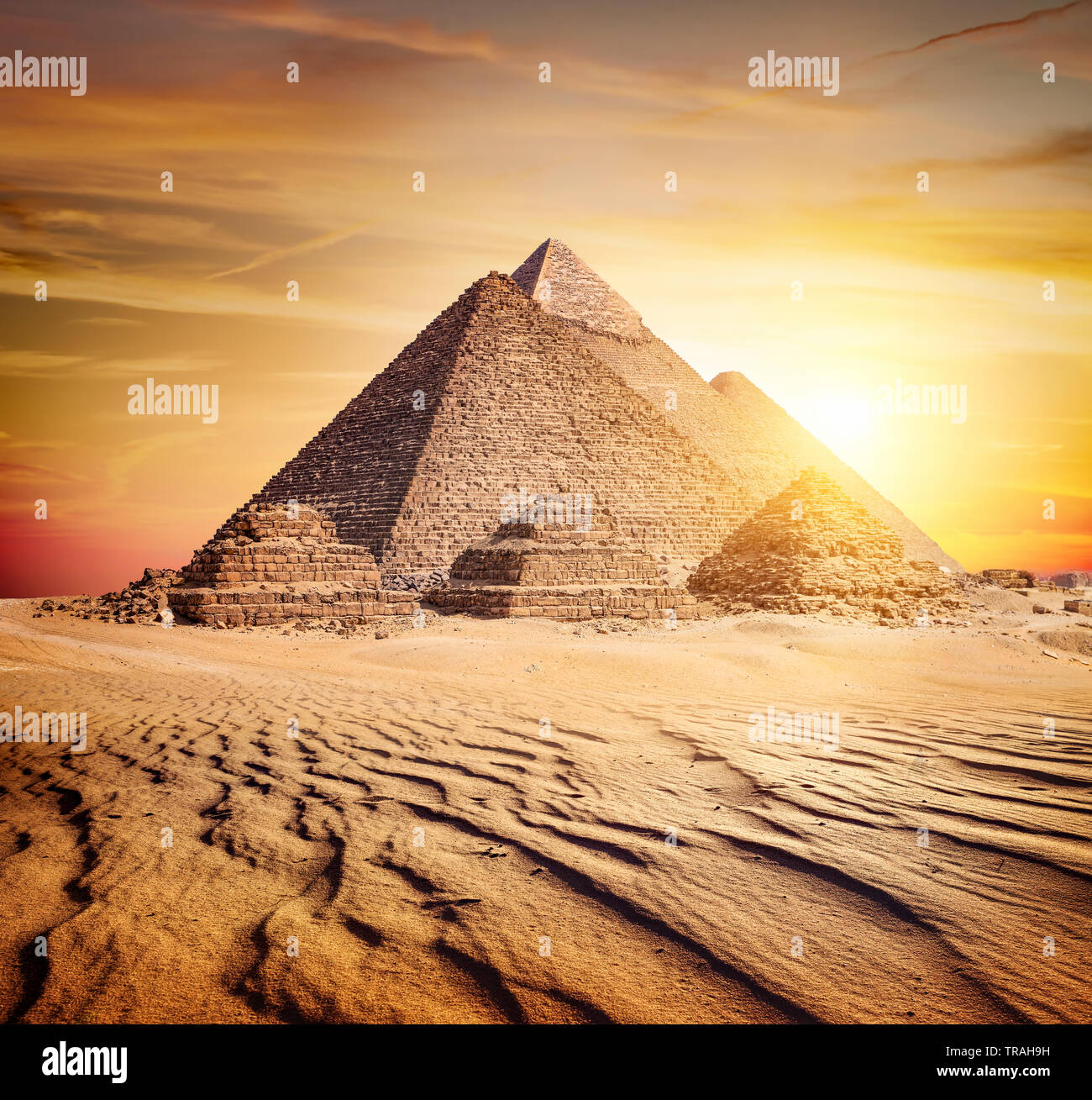 Egyptian pyramid in sand desert and clear sky Stock Photo - Alamy