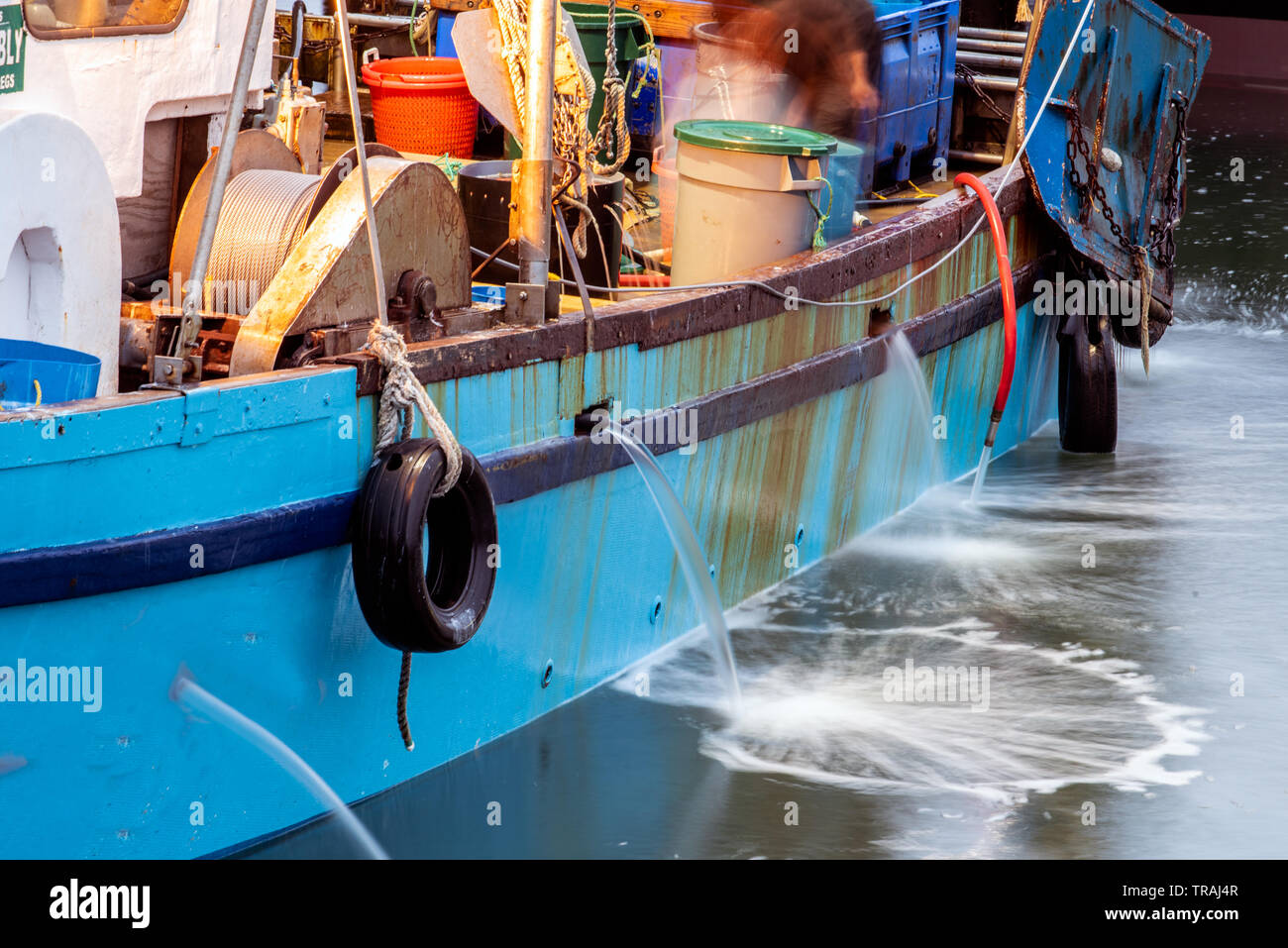 Spilling water from the water vessel hi-res stock photography and ...