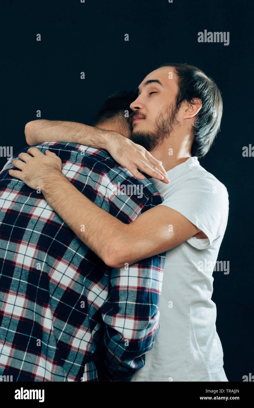Guys hugging hi-res stock photography and images - Alamy