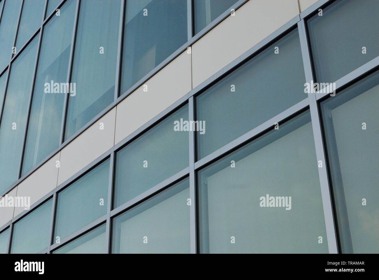 Detail of a modern curtain wall multi-story building Stock Photo - Alamy