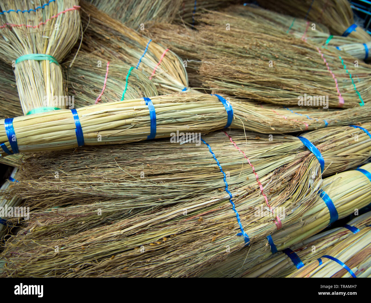 A lot of knitted brooms made from plant materials Stock Photo - Alamy