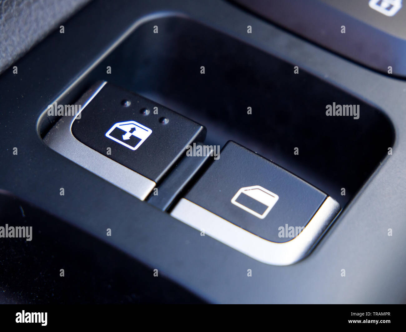 Window control buttons on the side of the car door Stock Photo - Alamy
