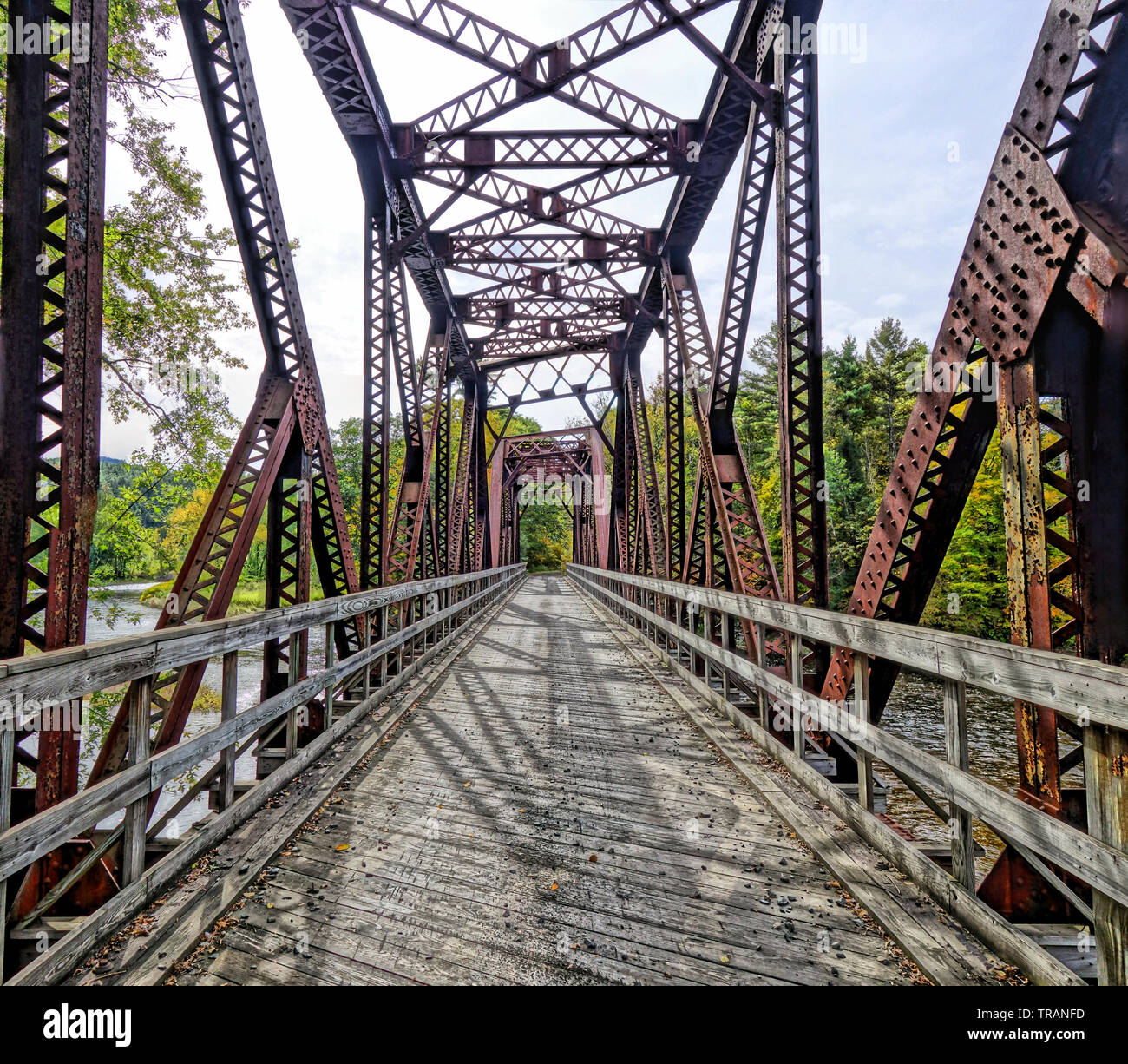 A iron constructed pedestrian bridge Stock Photo - Alamy