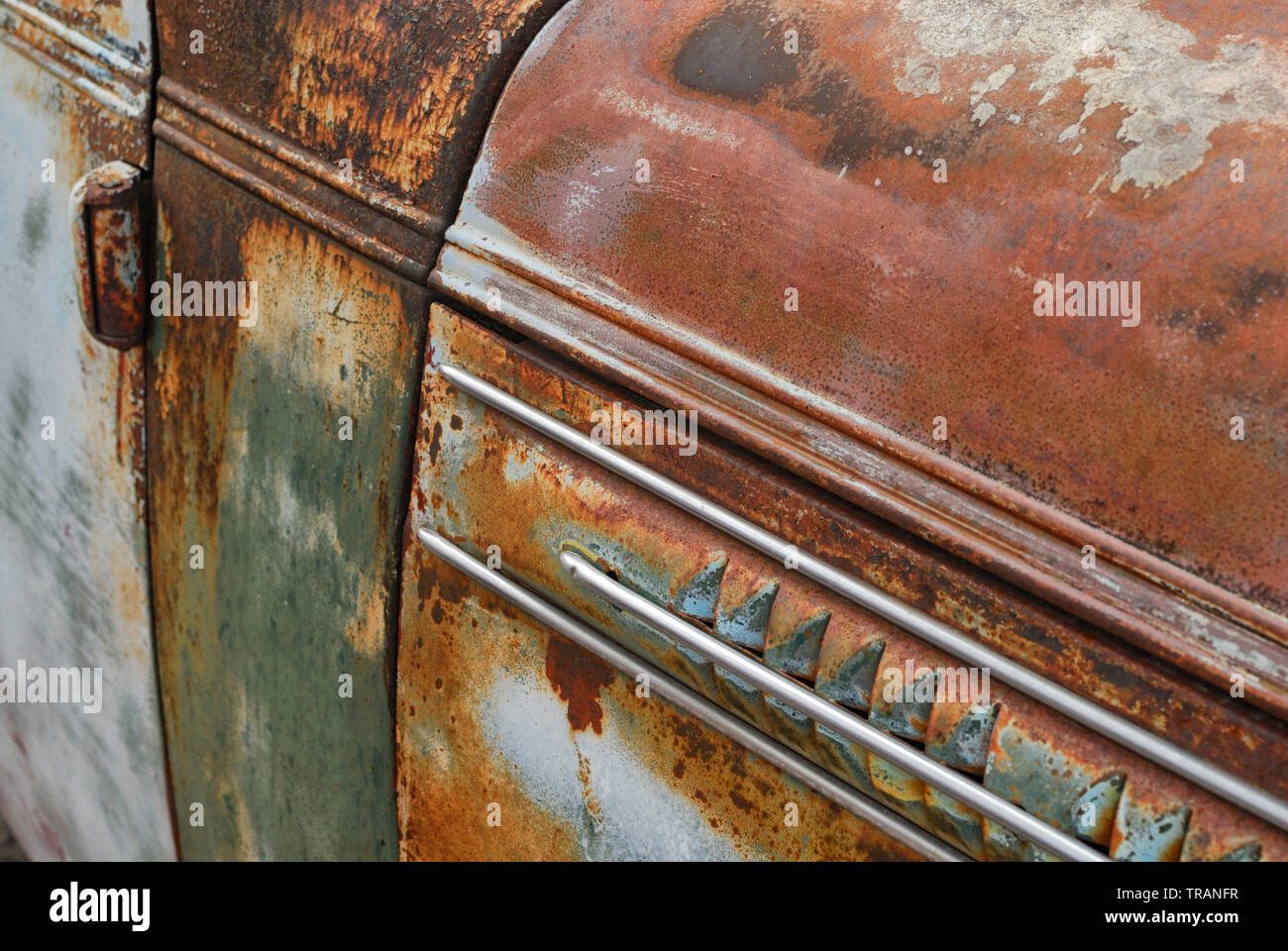 The colorful corrosion of a classic car sitting in a junkyard Stock ...