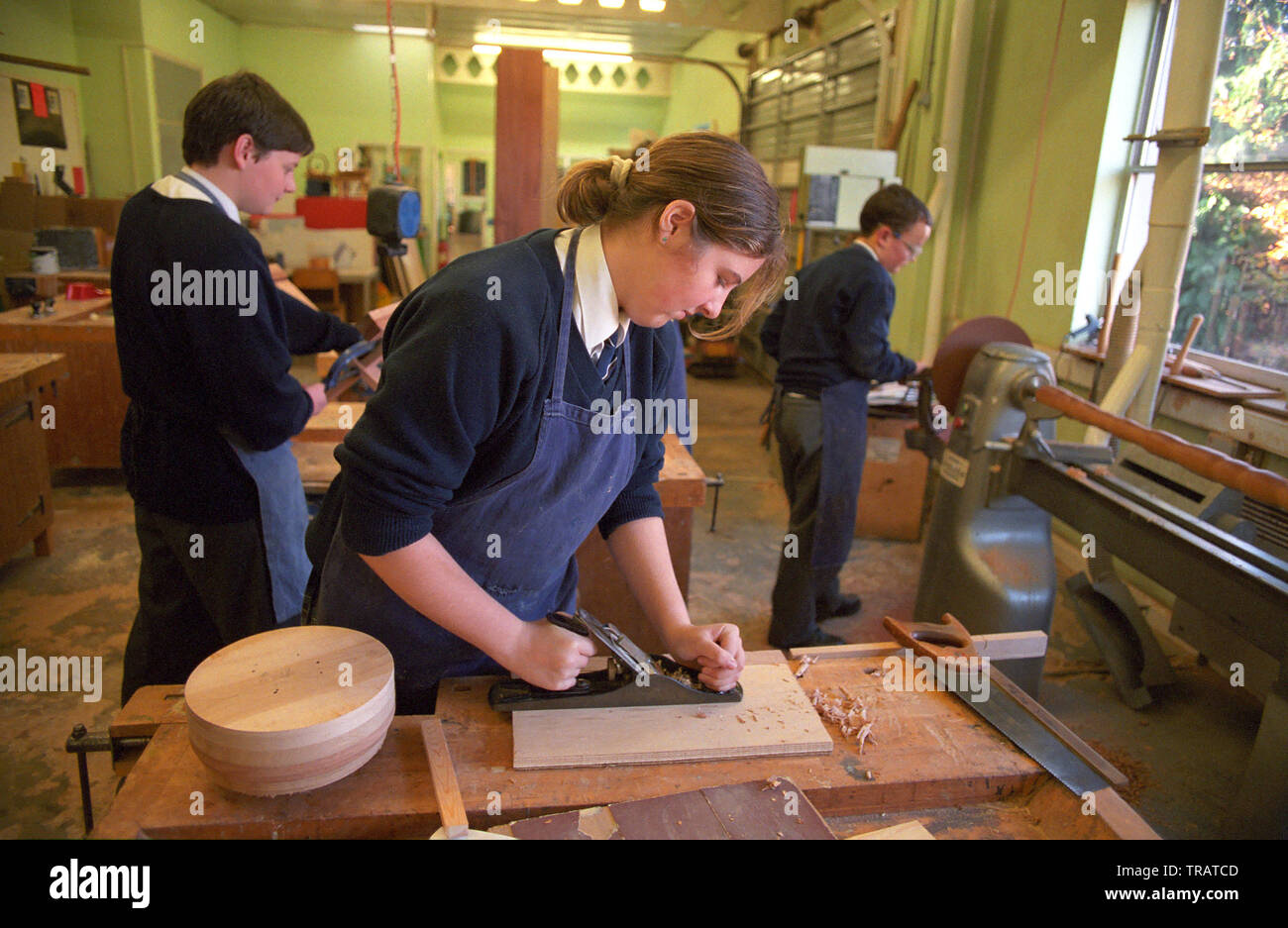 Teenage school children in a woodwork craft class in a Devon school ...