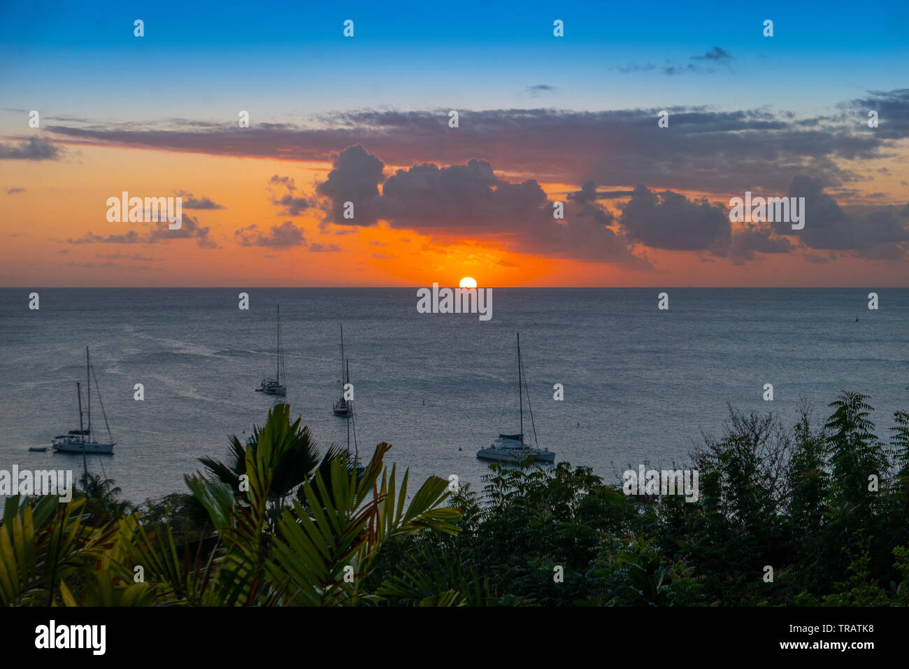 Sunset on caribbean tropical island hi-res stock photography and images ...