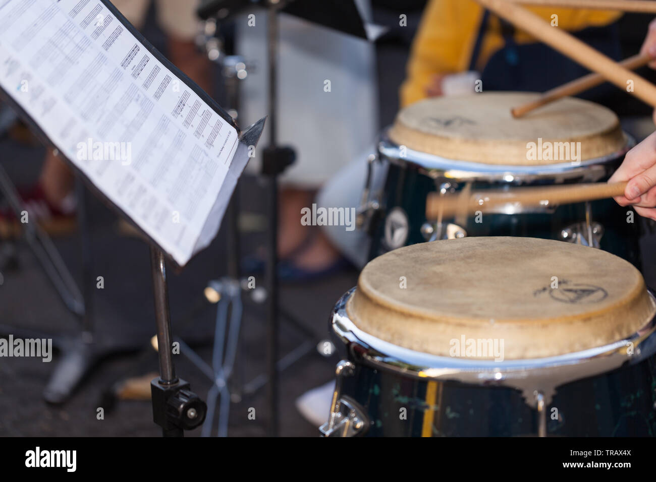 musicians playing bongo drums Stock Photo - Alamy
