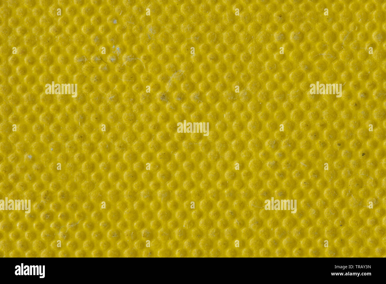 Macro image of the yellow texture of a book cover Stock Photo - Alamy