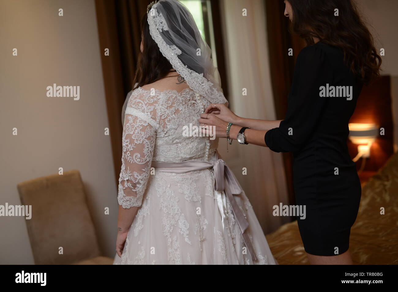 The bride is getting ready for her wedding Stock Photo - Alamy
