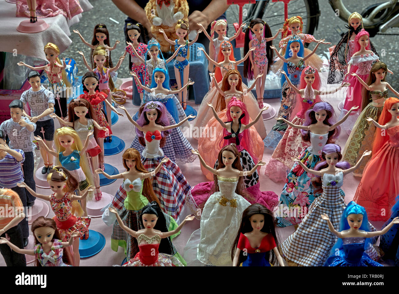 Dolls for sale on a Thailand market stall Stock Photo - Alamy