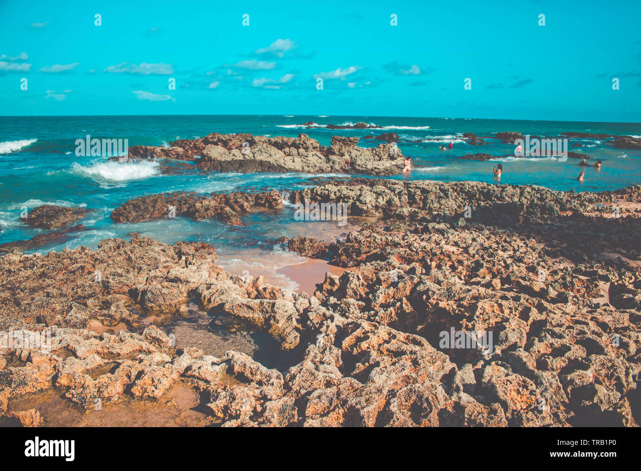 Sea waves hitting rocks on the beach. Big waves in the sea - blue water ...