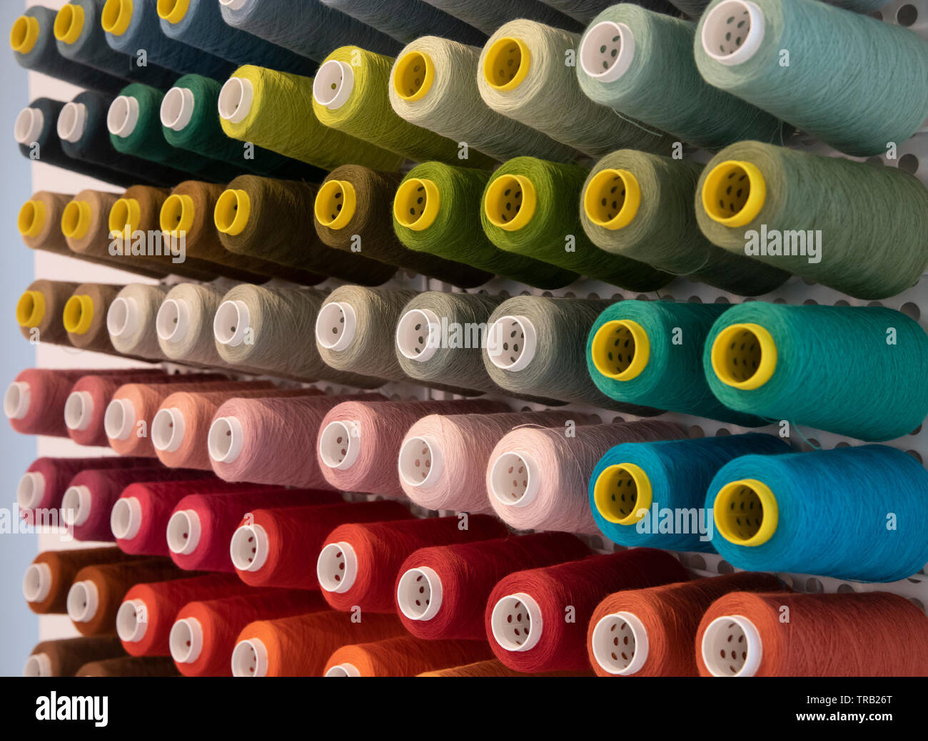 Coloured yarn reels Stock Photo - Alamy