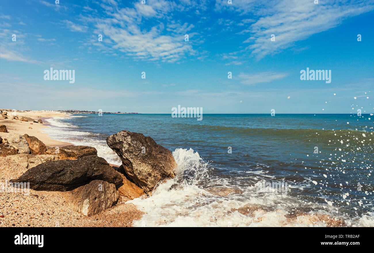 Sunny sky pacific wave splash sea rocks hi-res stock photography and ...