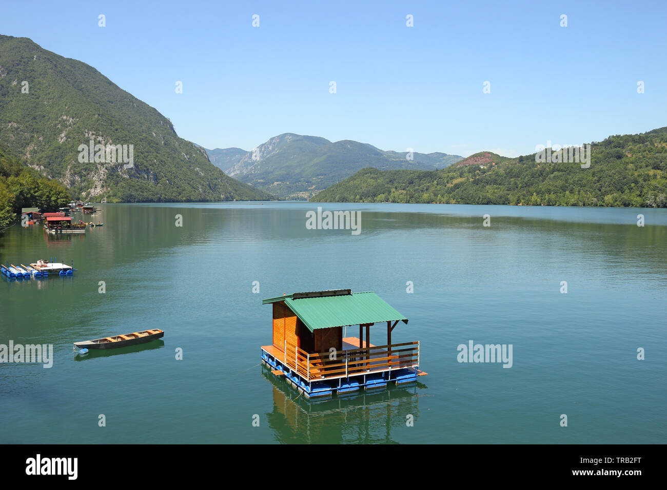 Small wooden house floating on Drina river Serbia Stock Photo - Alamy