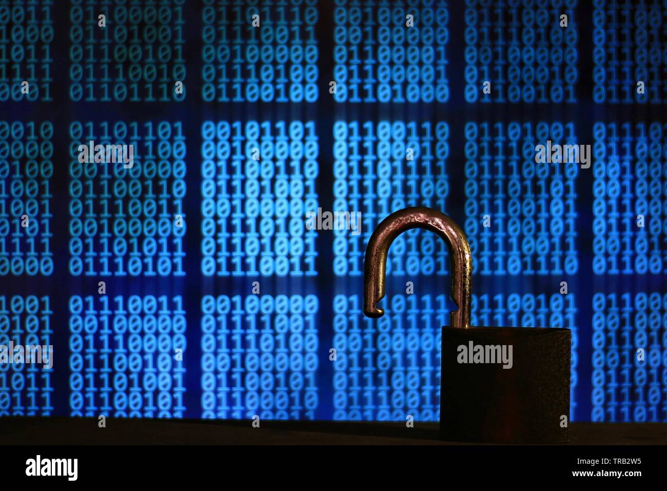 opened padlock in front of binary code blocks background. cyberspace ...