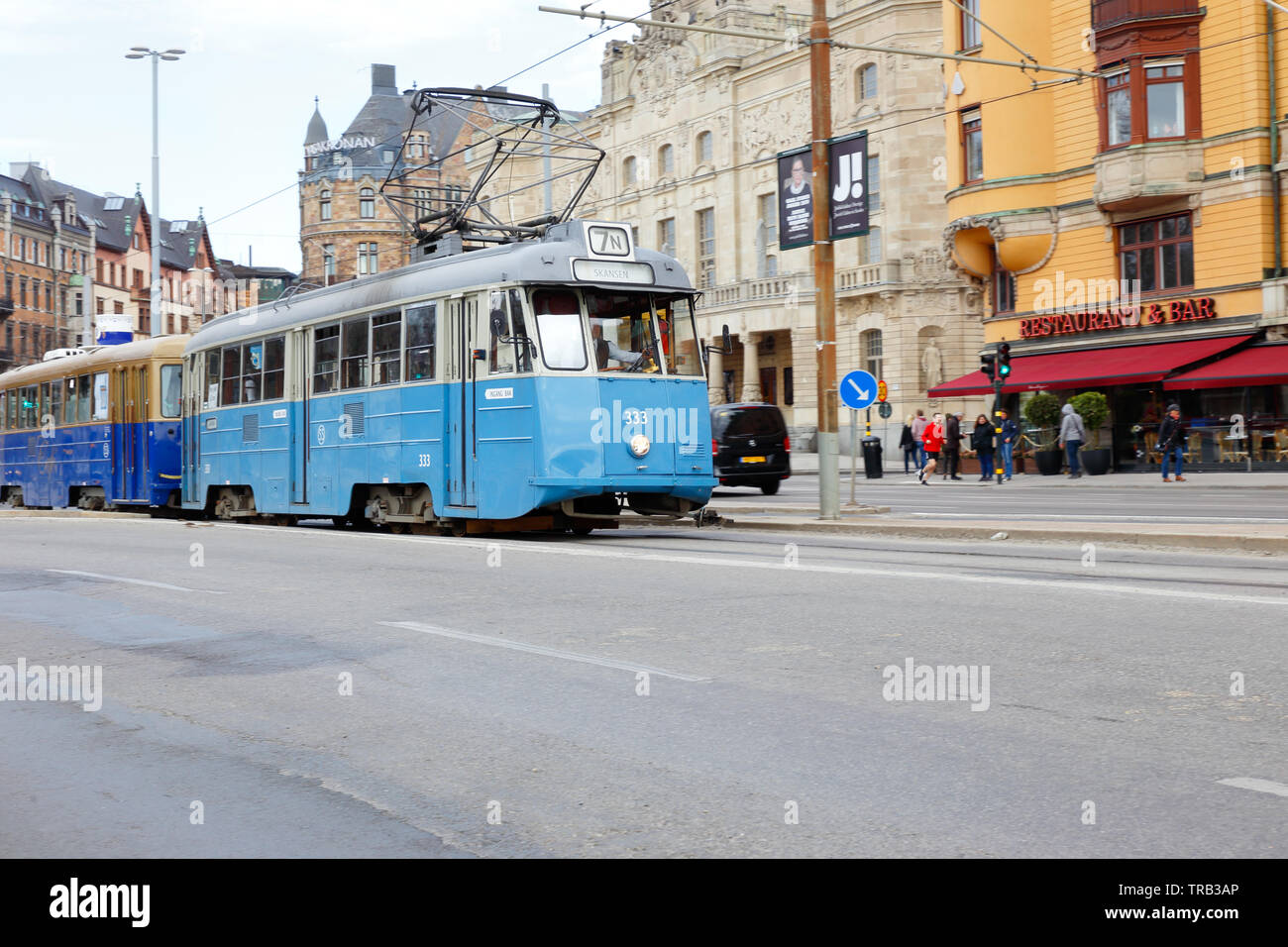 Stockholm, Sweden - April 22, 2019: A vintage blue tram at Nybroplan in ...