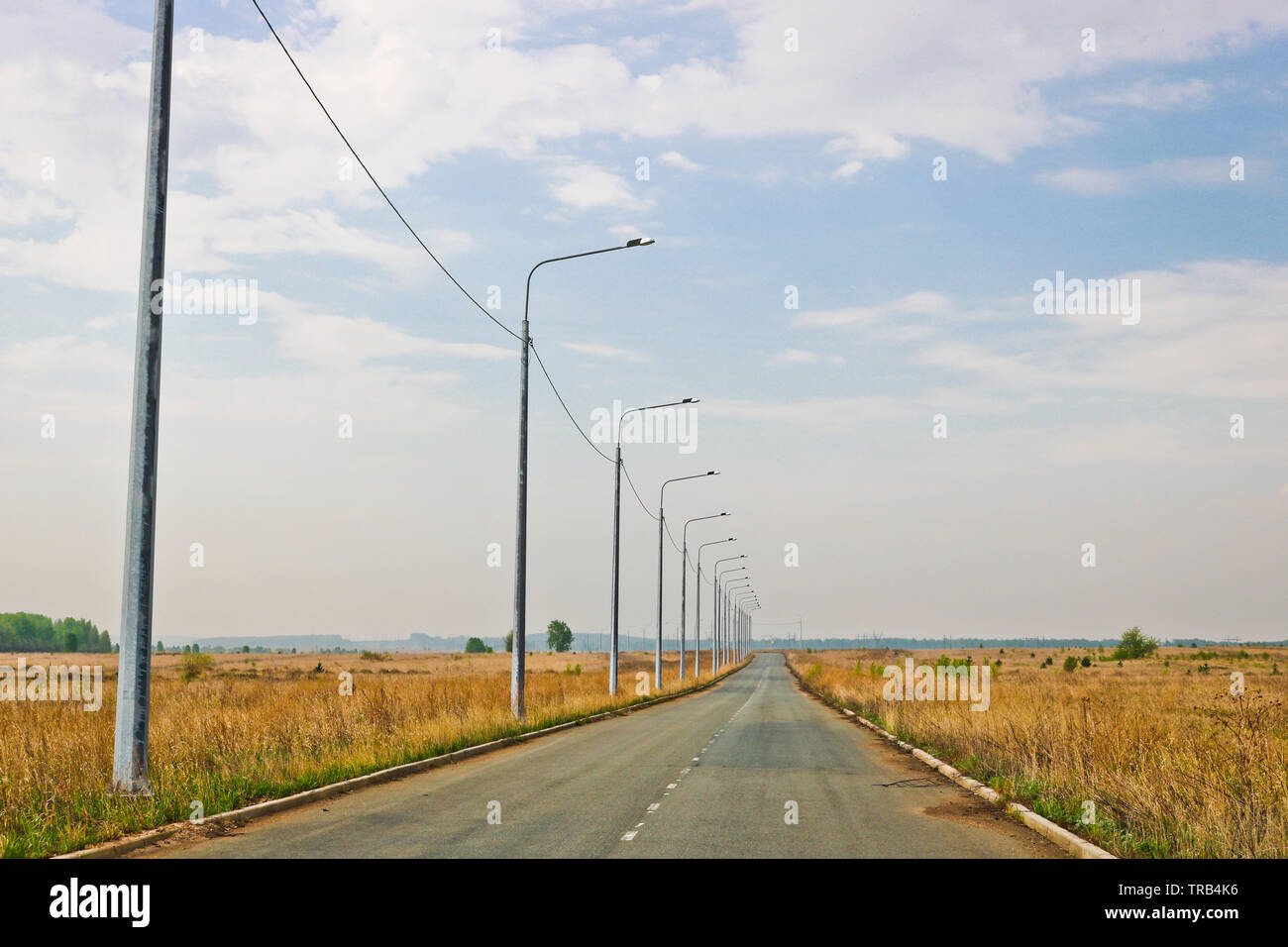 Street lighting on country lane hi-res stock photography and images - Alamy
