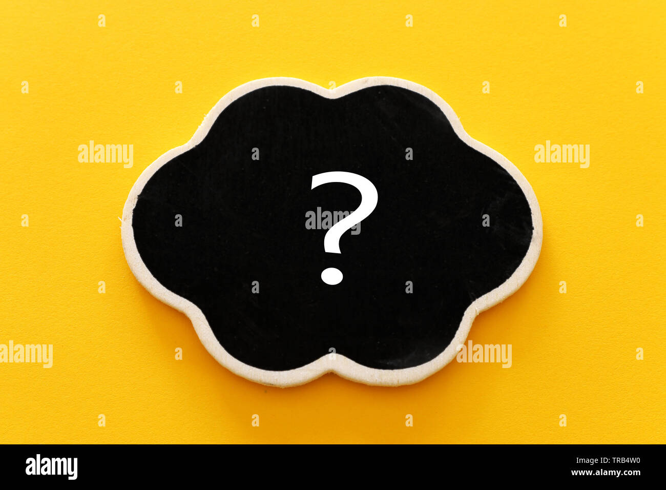Chalkboard with question mark sign over yellow background Stock Photo ...
